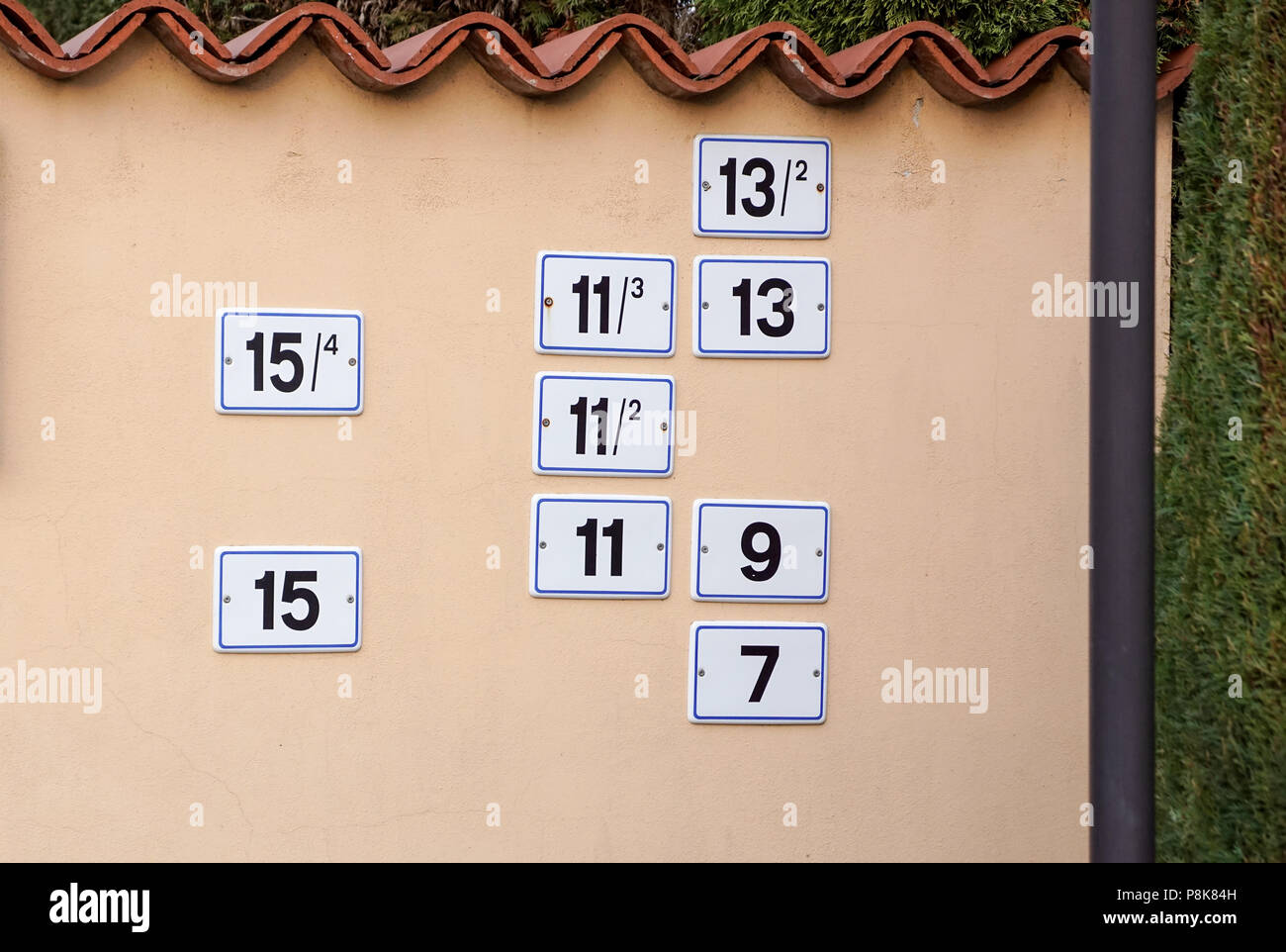 A great multitude of civic numbers . urban residential Stock Photo - Alamy