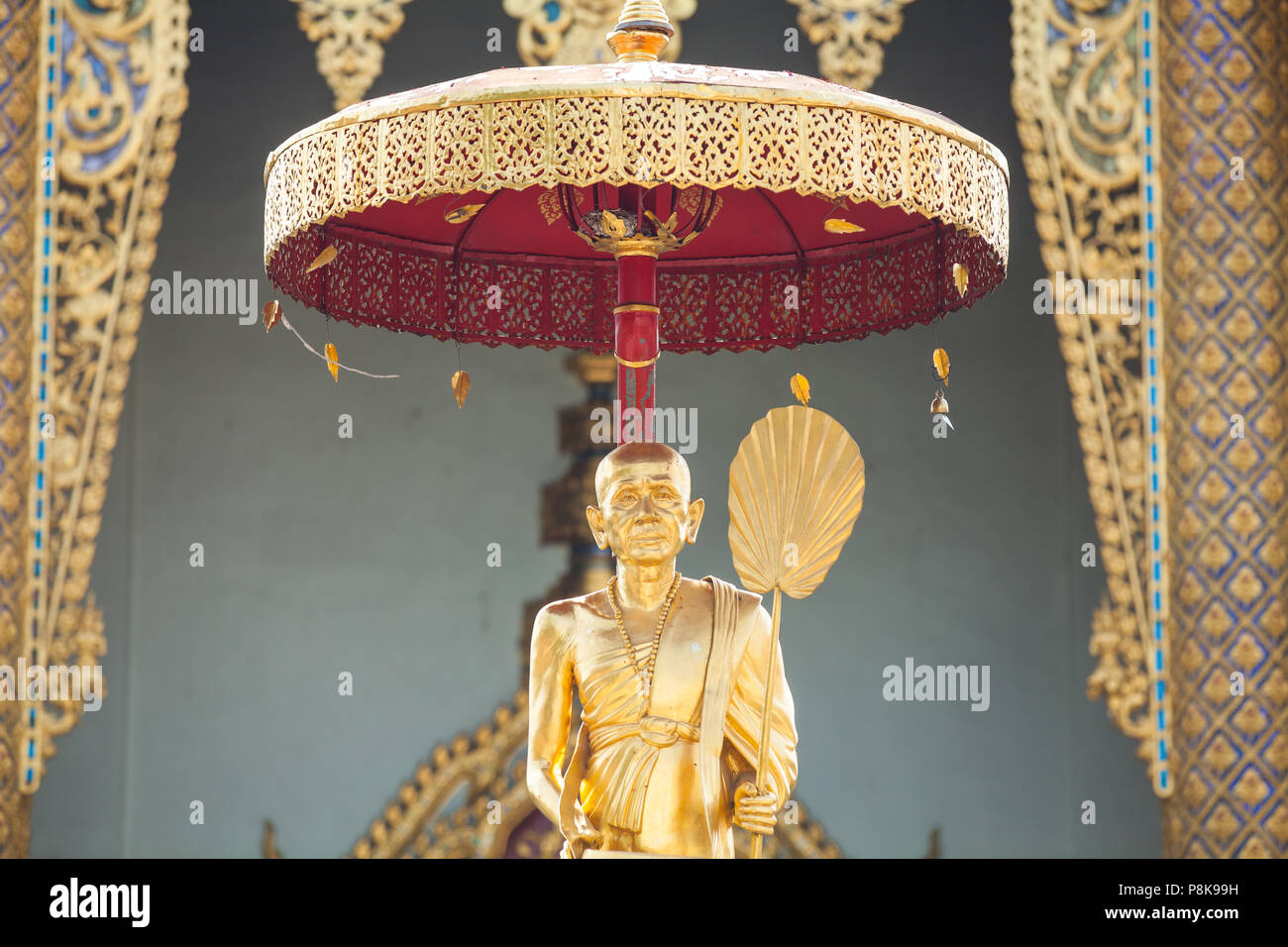 Golden buddhist monk statue hi-res stock photography and images - Alamy