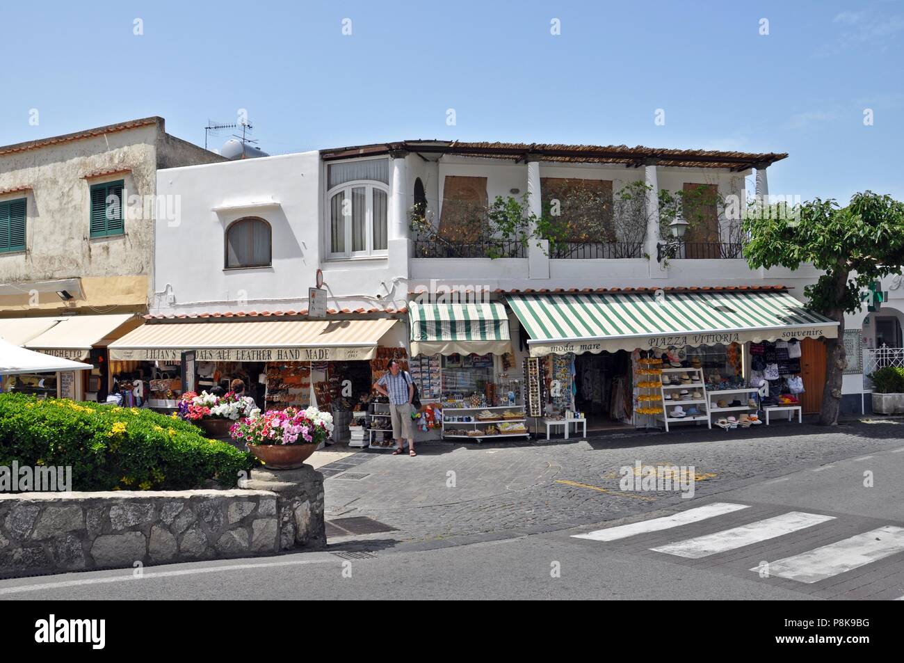 Market on the corner of the shopping street Stock Photo - Alamy