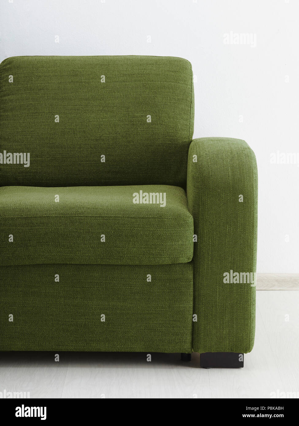 Sofa in white room. Close-up Stock Photo - Alamy