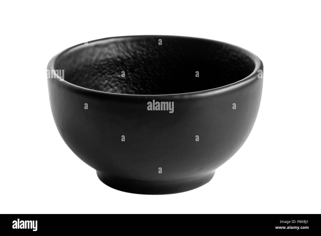 Small black empty ceramic bowl isolated on white Stock Photo - Alamy