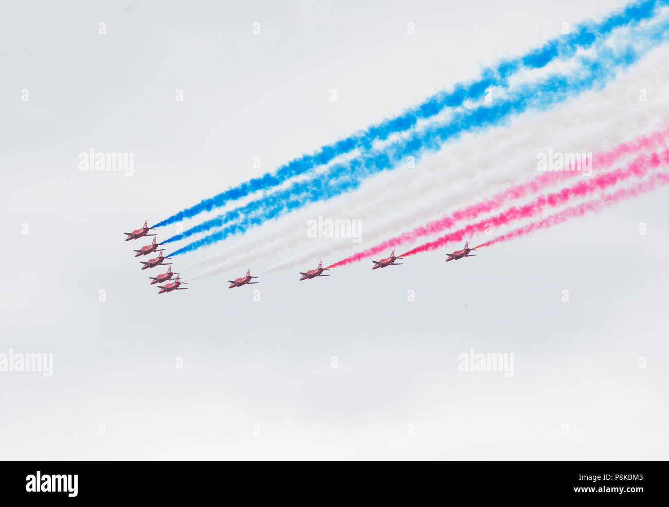 The Red Arrows fly in formation at the Flypast over London to ...