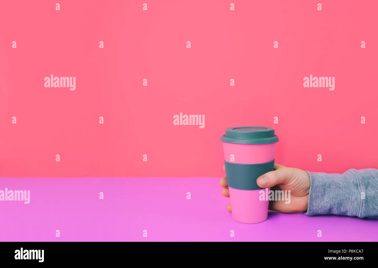Hand holding take away coffee cup Stock Photo - Alamy