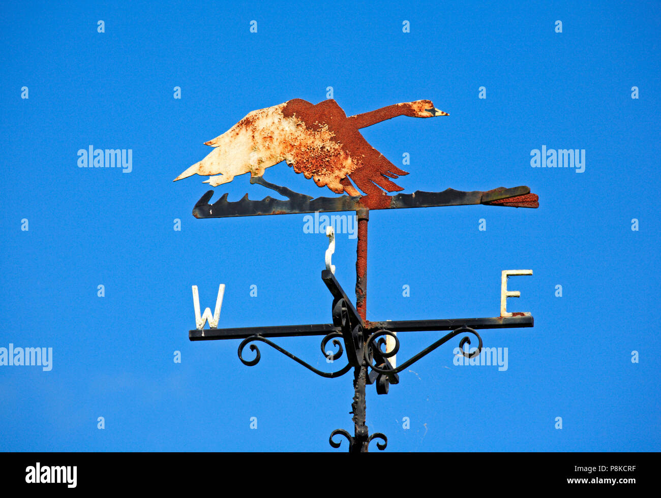 A rusting weather vane sited on the Norfolk Broads by the River Bure at ...