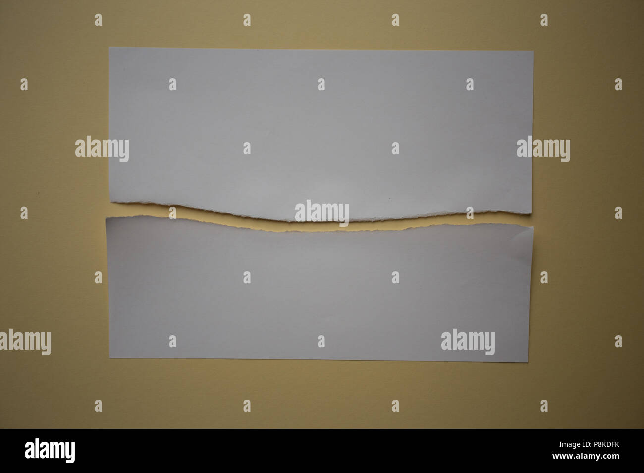 Half torn paper hi-res stock photography and images - Alamy