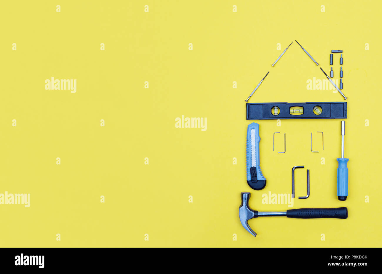 Selection of tools in the shape of a house Stock Photo - Alamy