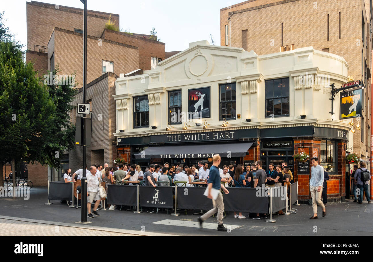 The busy outdoor seated area outside the popular White Hart public ...