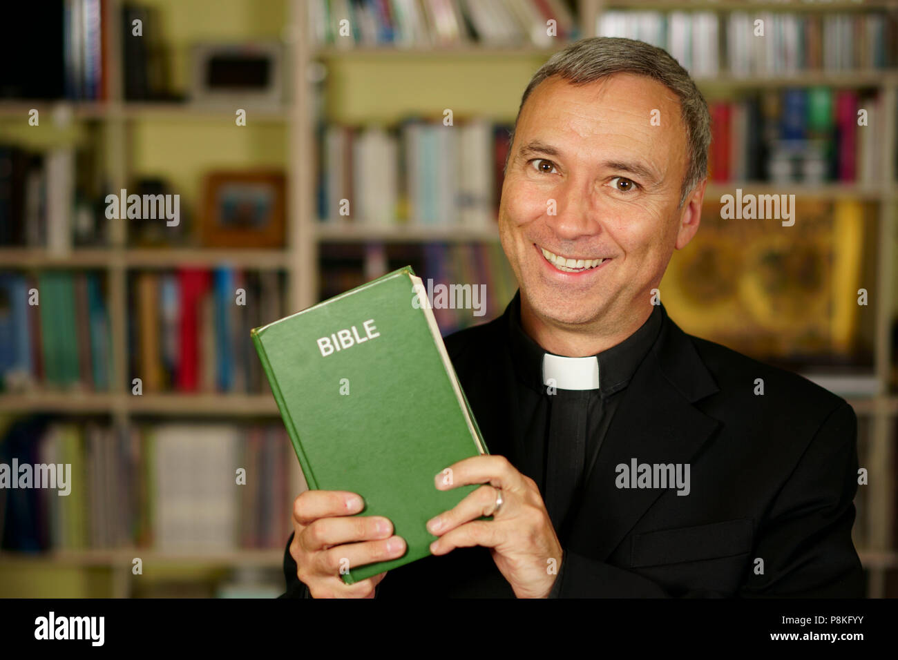 Man reading holy bible hi-res stock photography and images - Alamy