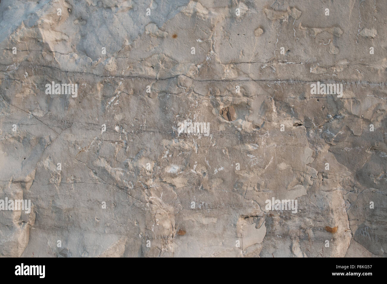 Closeup limestone rock face showing weathered strata and details for ...