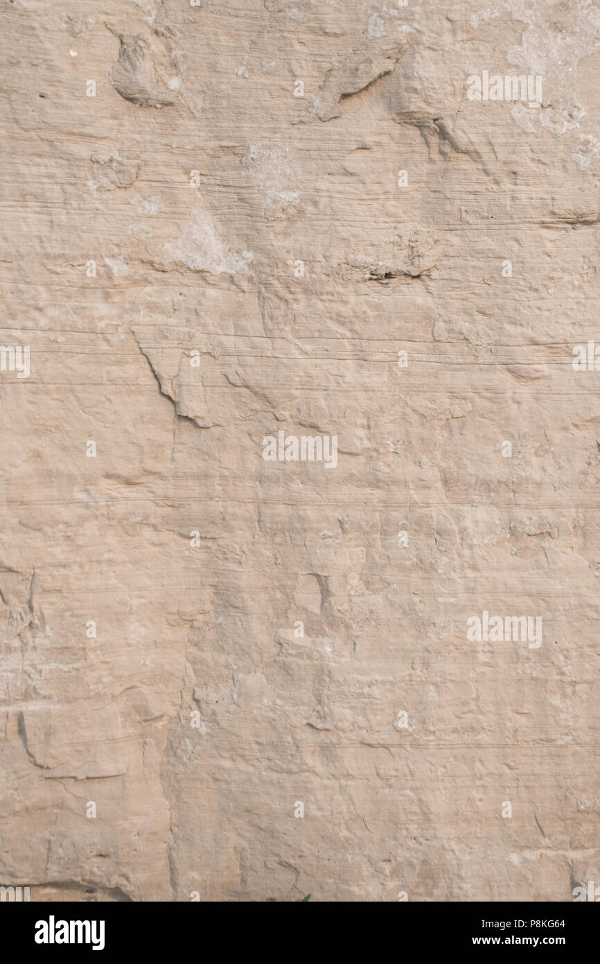 Closeup limestone rock face showing weathered strata and details for ...
