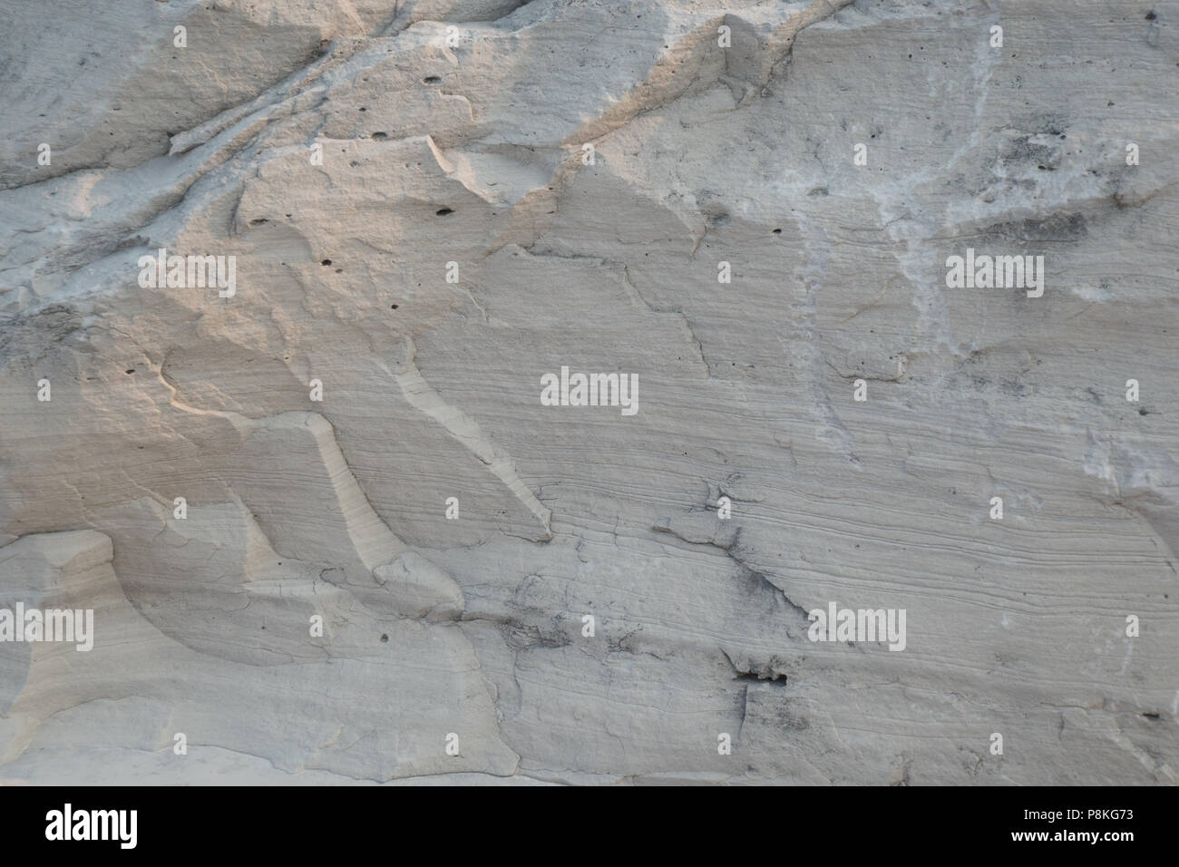 Closeup limestone rock face showing weathered strata and details for ...