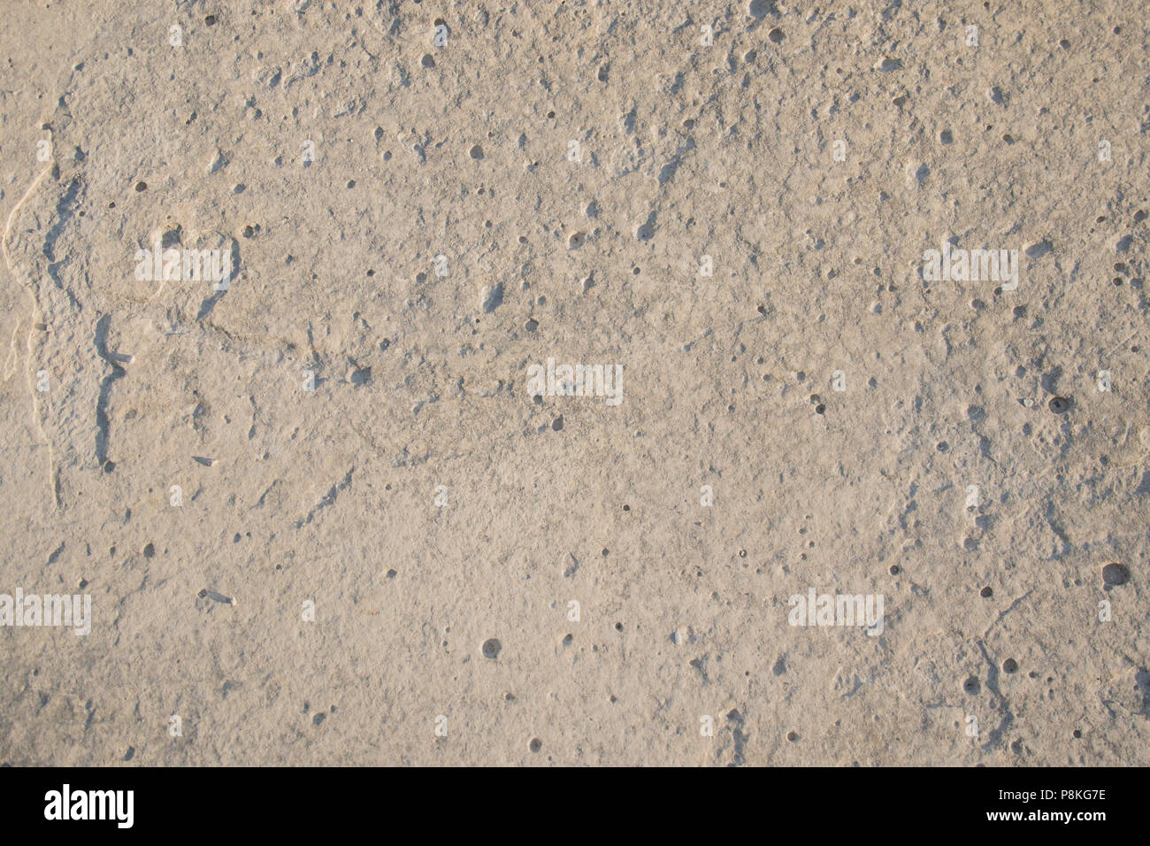 Closeup limestone rock face showing weathered strata and details for ...