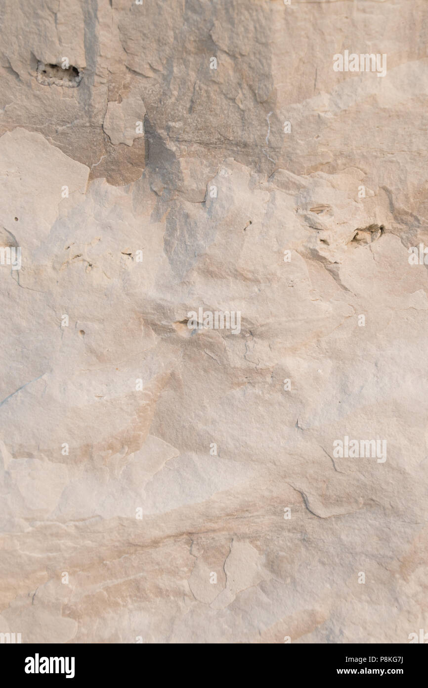 Closeup limestone rock face showing weathered strata and details for ...