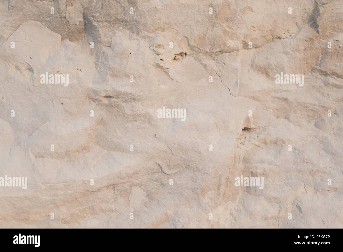 Closeup limestone rock face showing weathered strata and details for ...
