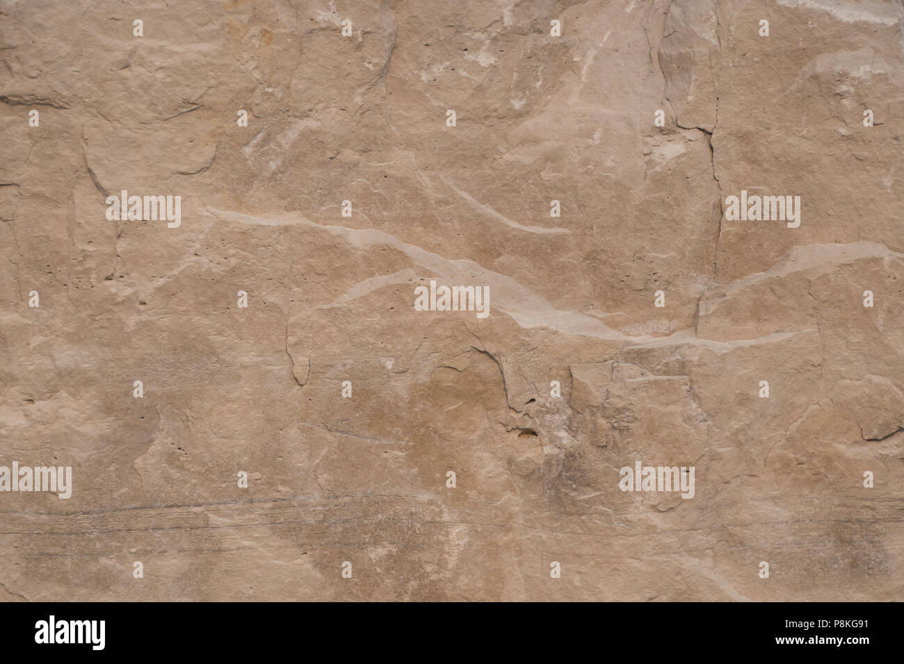 Closeup limestone rock face showing weathered strata and details for ...