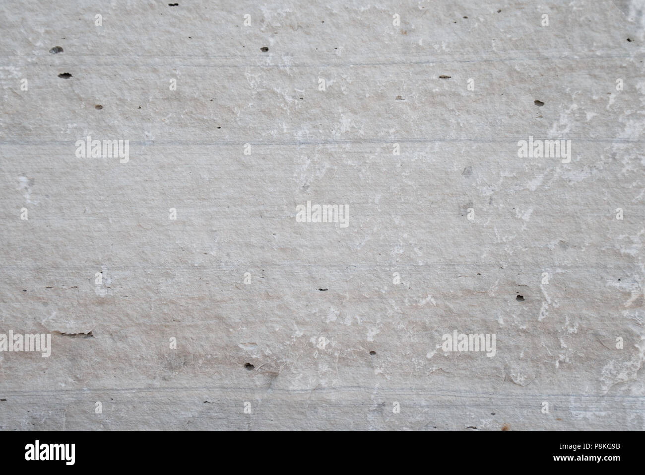 Closeup limestone rock face showing weathered strata and details for ...