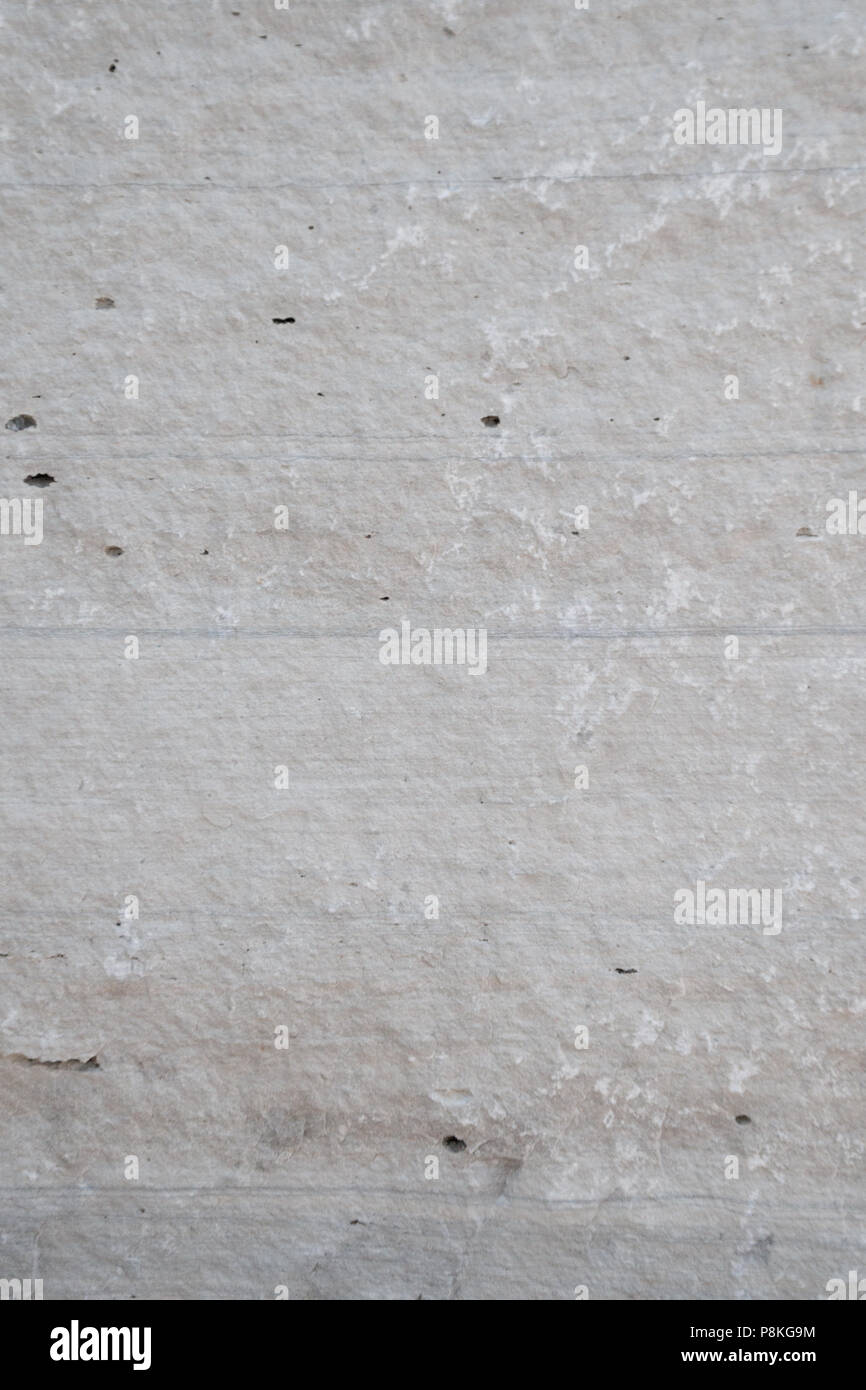 Closeup limestone rock face showing weathered strata and details for ...