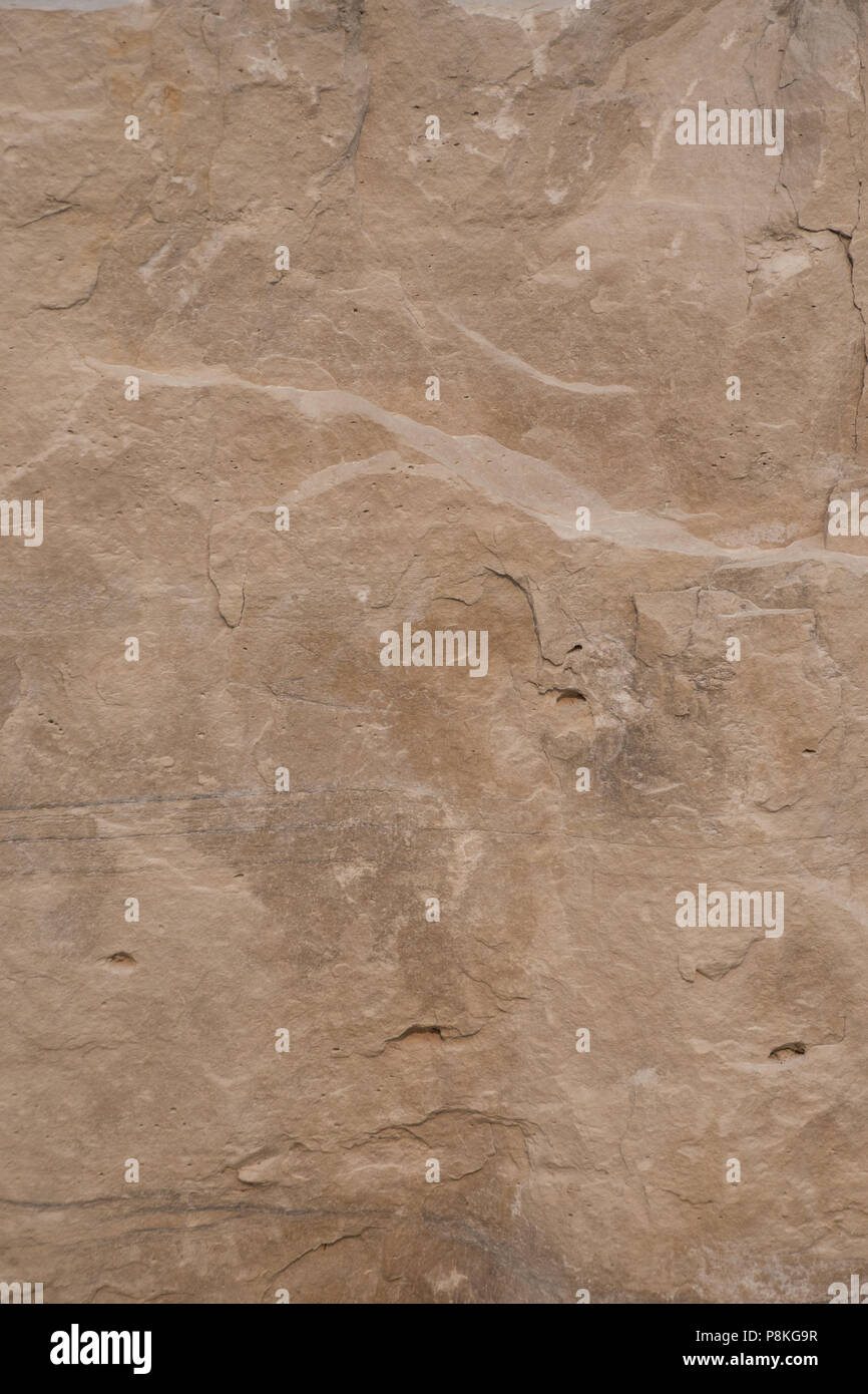 Closeup limestone rock face showing weathered strata and details for ...