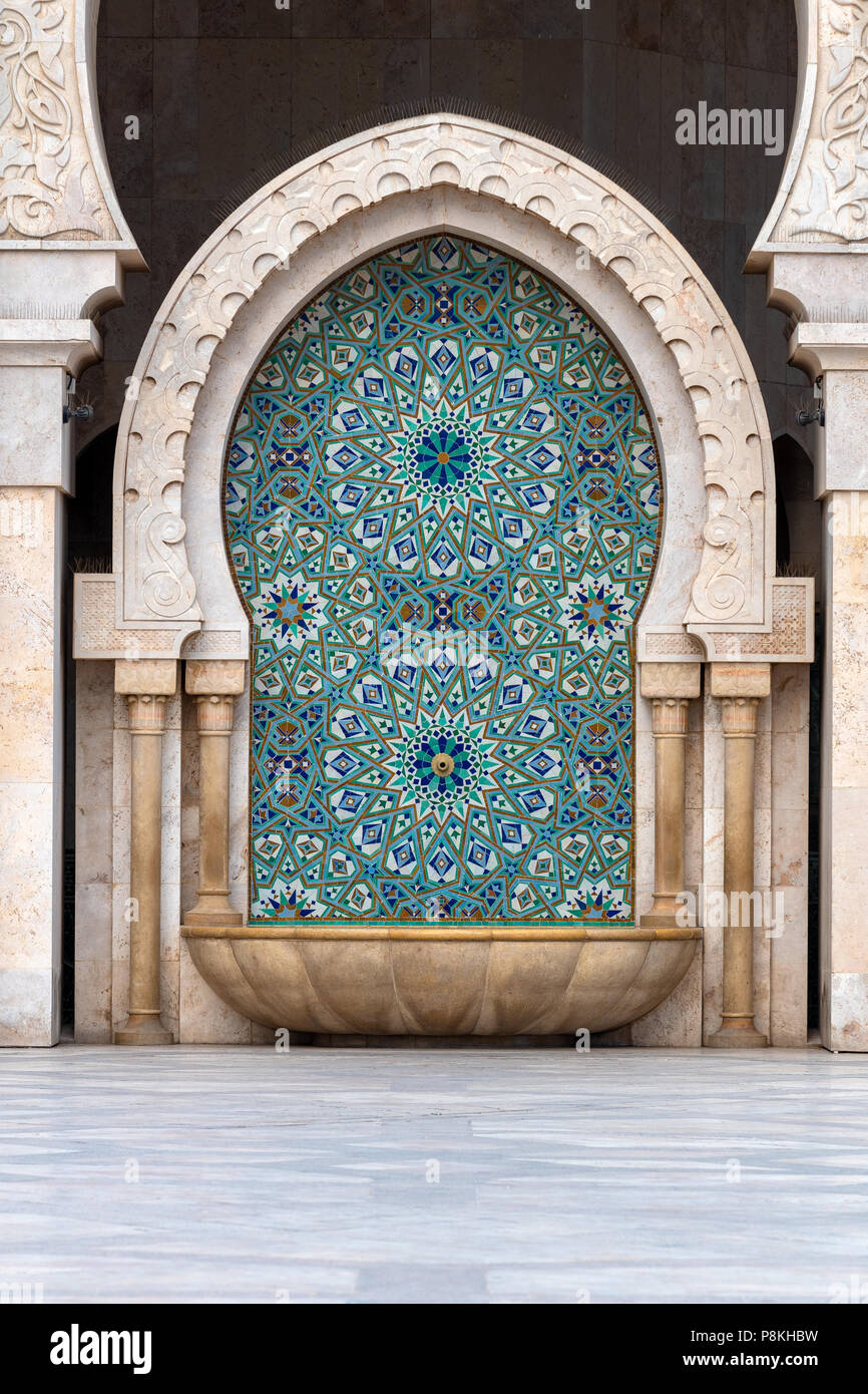 Large cleansing fountain on the exterior wall of Mosque Hassan II in ...
