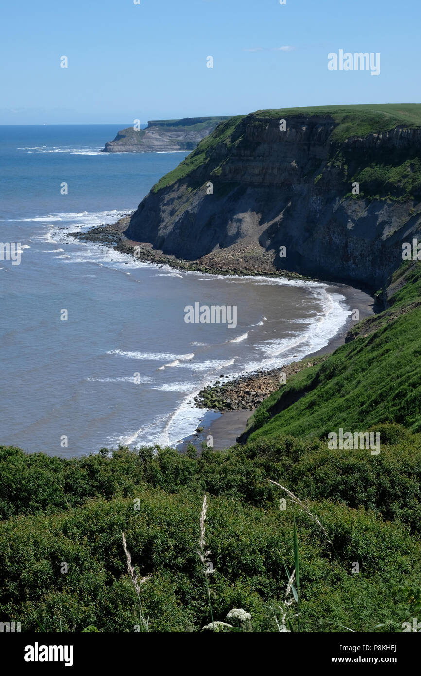 The bay stretches out to the cliffs beyond at Port Mulgrave on the ...