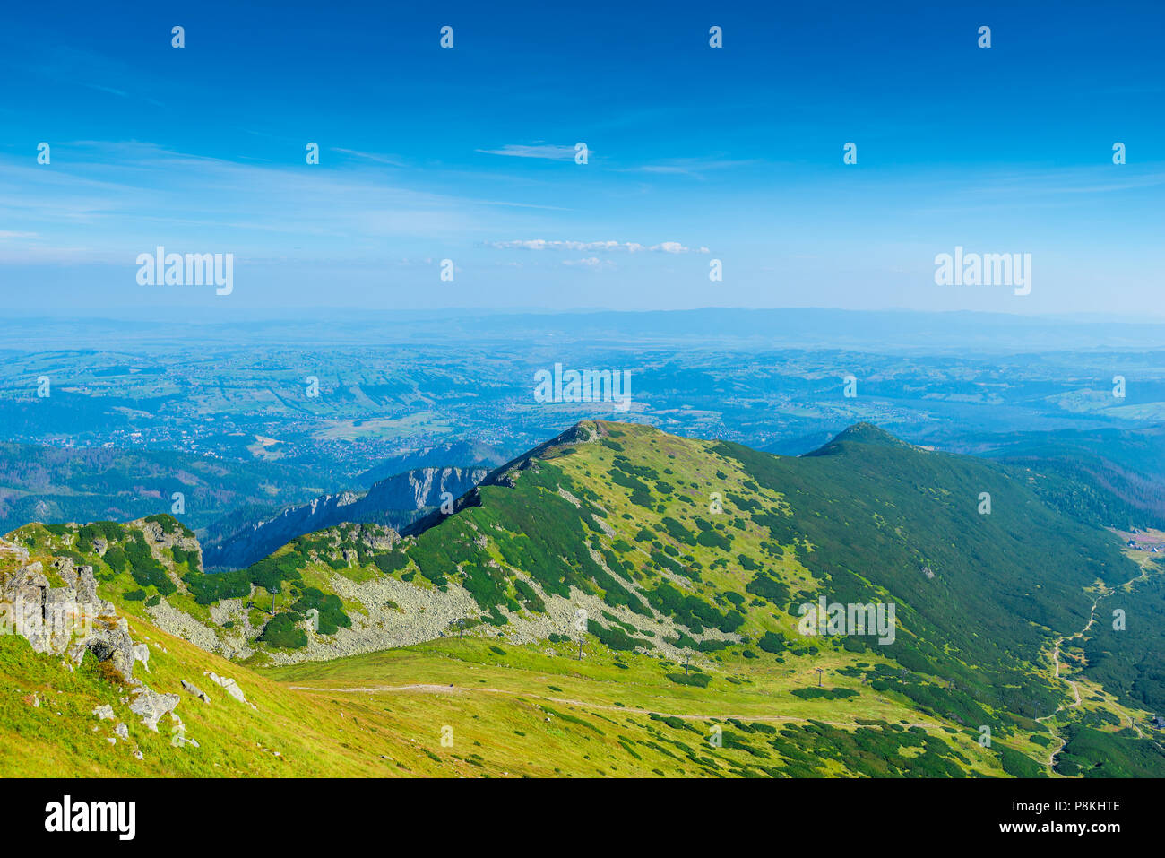 View from the mountain Kasprowy Wierch to the horizon and the valley of ...