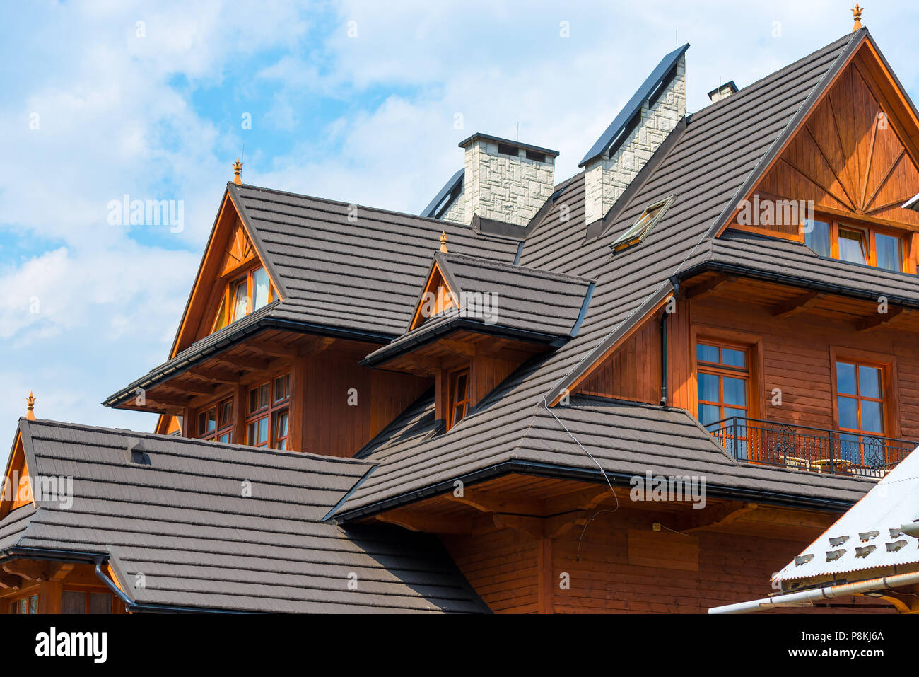 architectural elements of a wooden villa close-up Stock Photo - Alamy