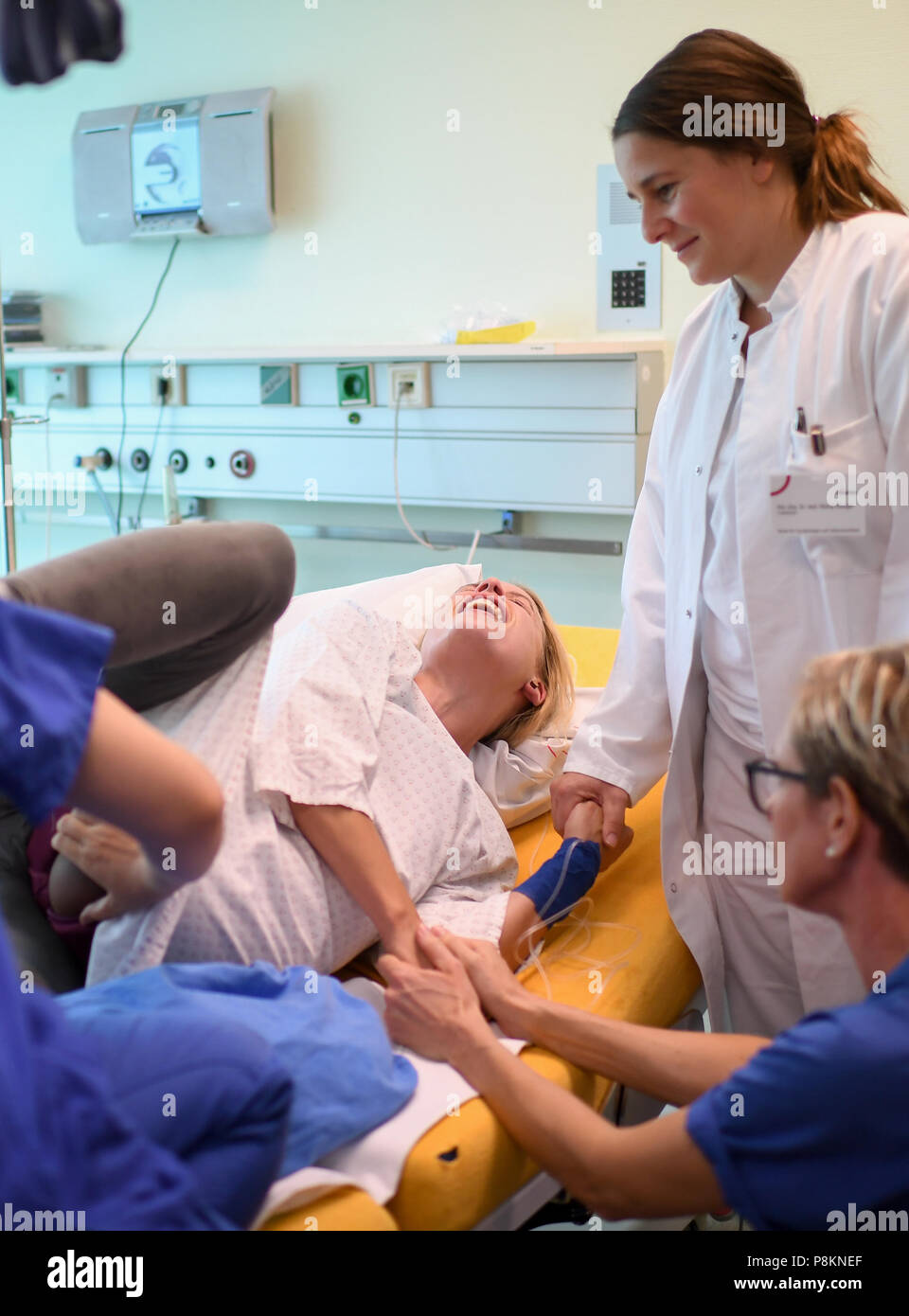 12 July 2018, Berlin, Germany: Britta Hoffmann, midwife, Kristin ...