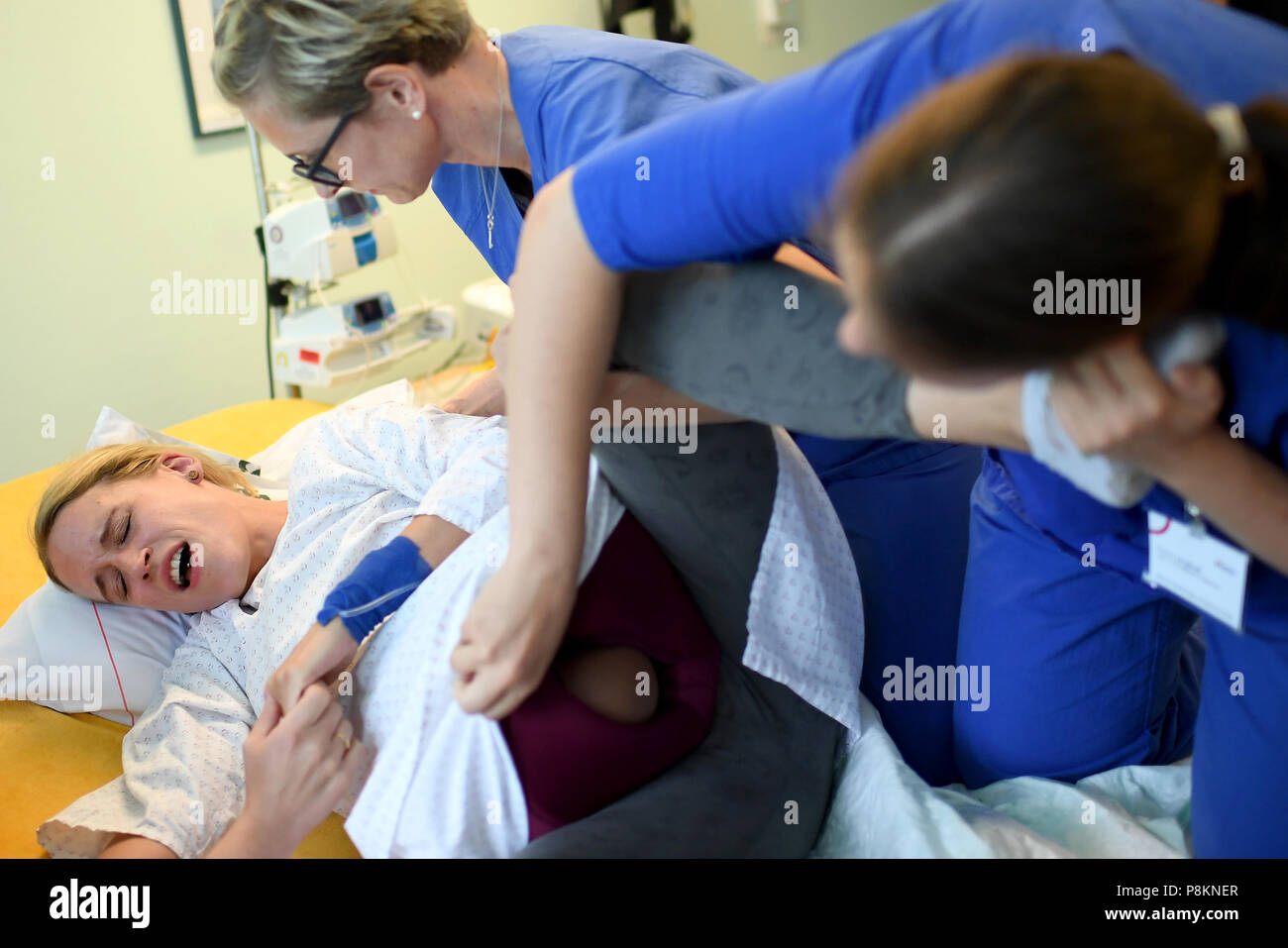 12 July 2018, Berlin, Germany: Midwives Britta Hoffmann (l-r), Romy ...