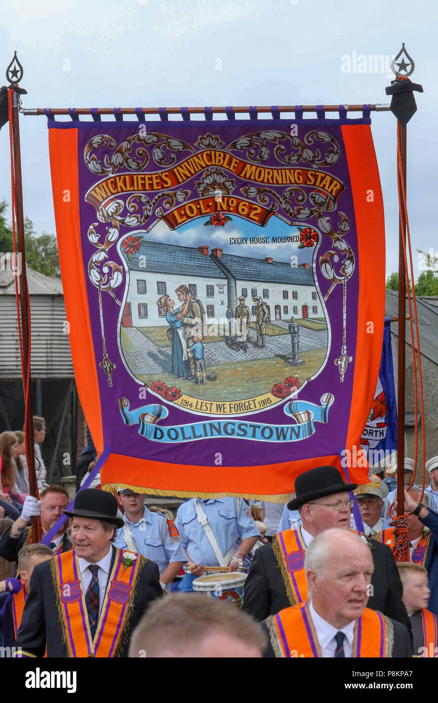 Orange men walking with banner hi-res stock photography and images - Alamy