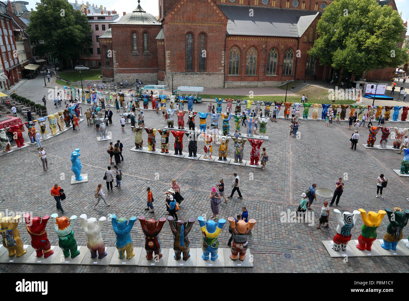 Riga, Latvia. 12th July, 2018. Berliner Buddy-Bears Special Editions, "Golden Rule" and "Global ...