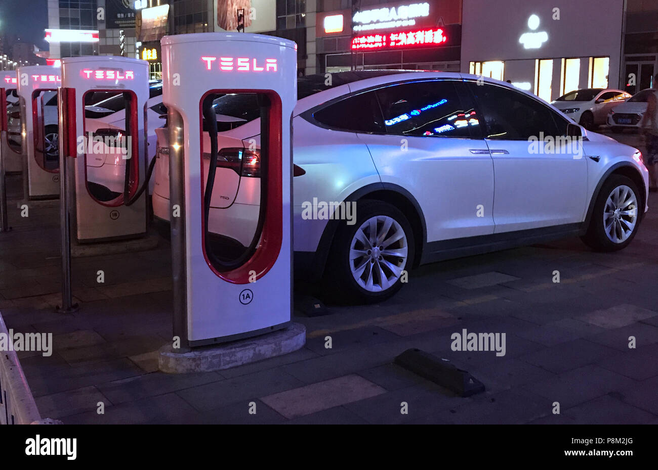 Charging poles hi-res stock photography and images - Alamy