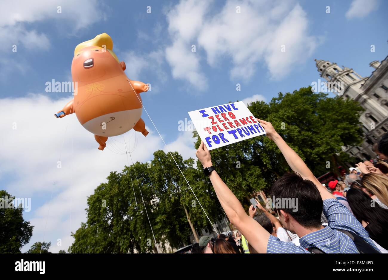 A six-metre balloon depicting as US President Donald Trump a nappy-clad ...