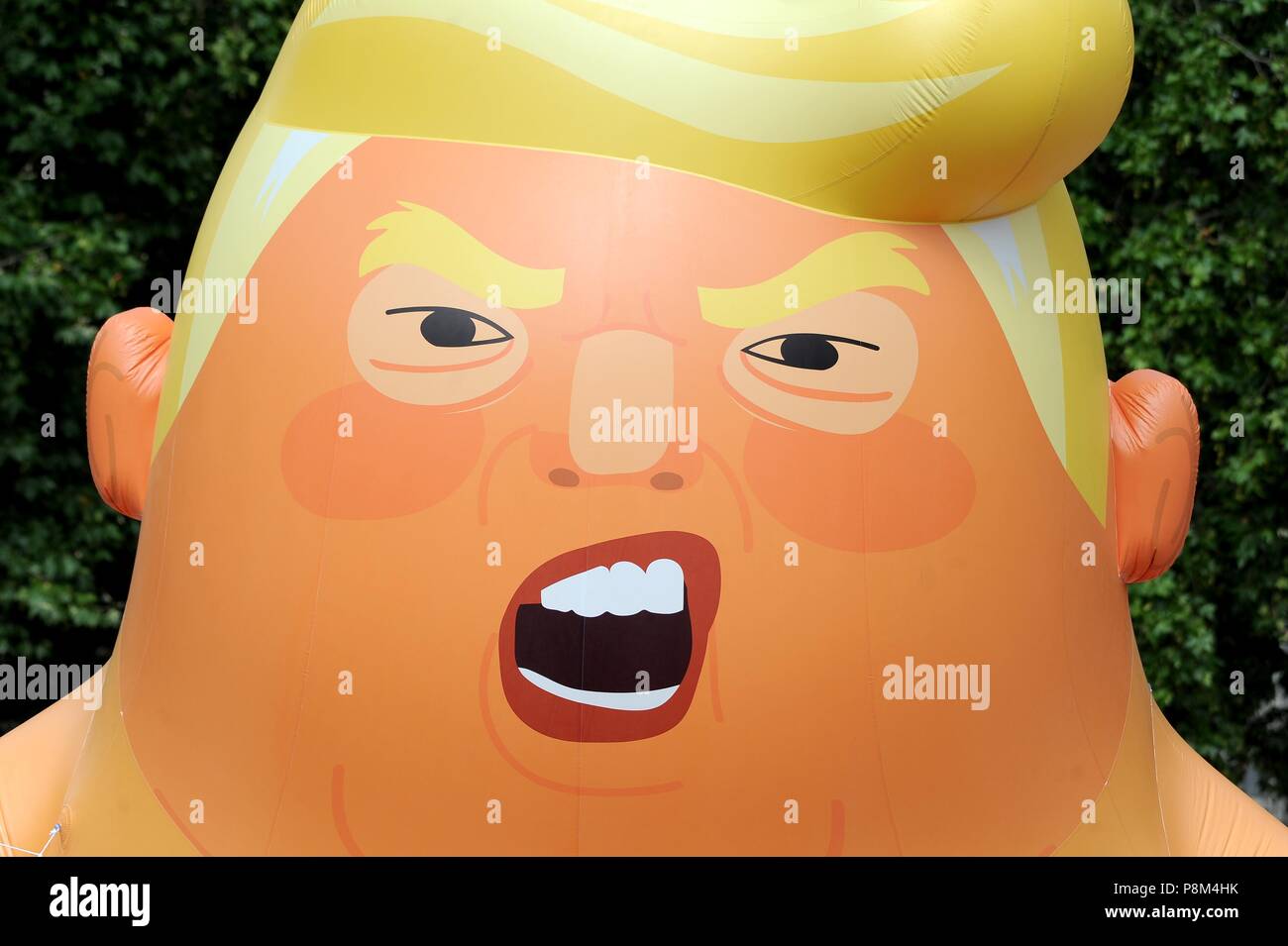 A six-metre balloon depicting as US President Donald Trump a nappy-clad ...