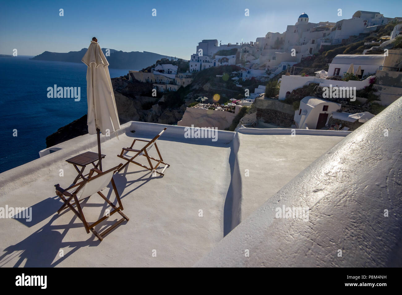 Terrace with view, incredibly romantic scene, Santorini. Fira, Greece ...