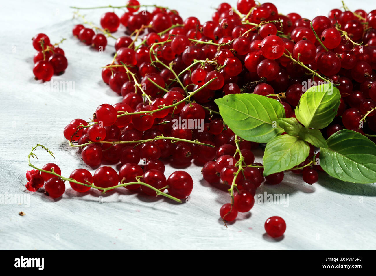 Fresh red currants on light rustic table. Healthy summer fruits Stock ...