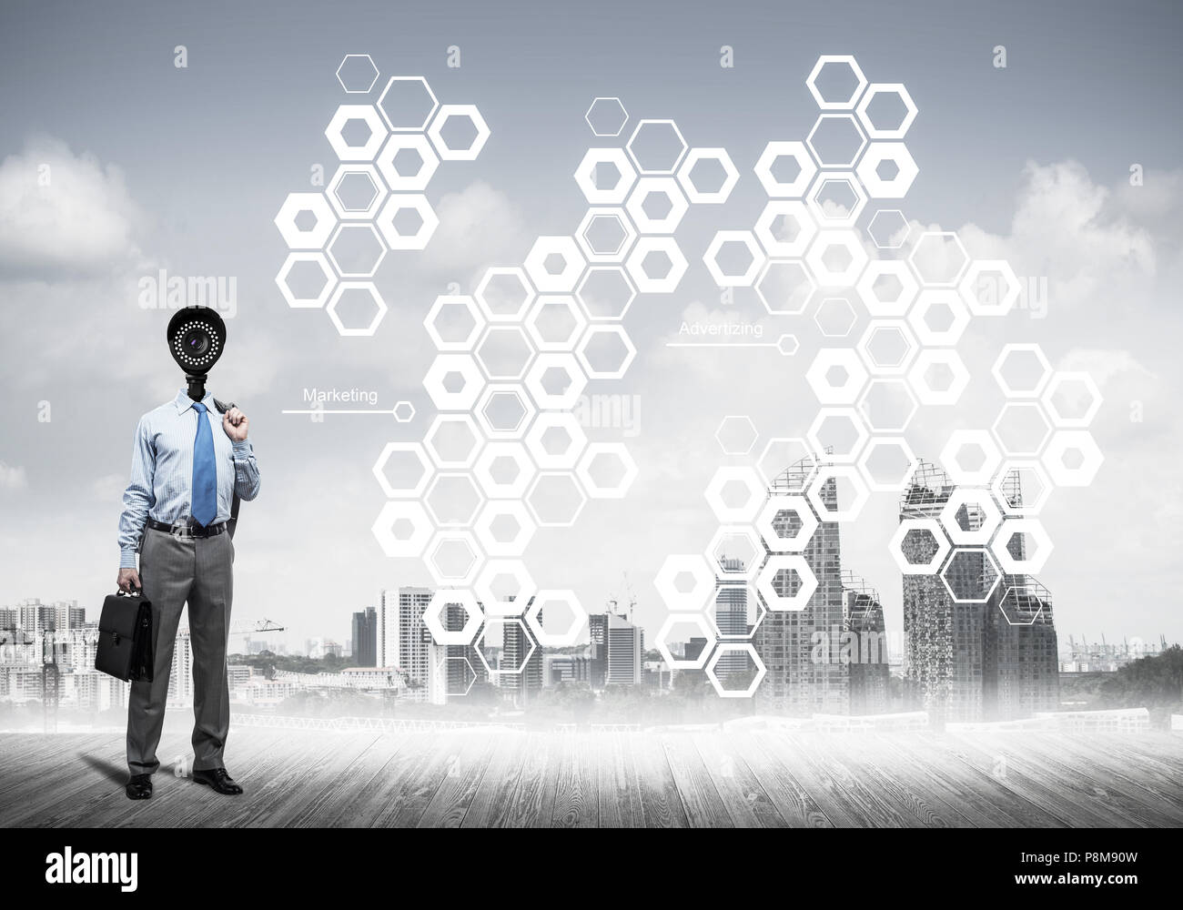 Camera headed man standing on wooden floor against modern citysc Stock ...