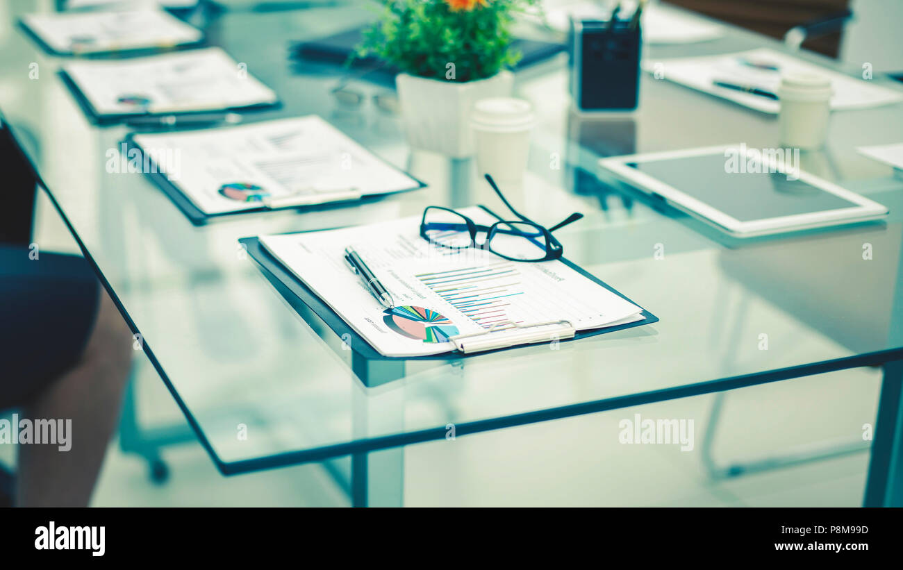 financial charts on the table before business meeting Stock Photo - Alamy