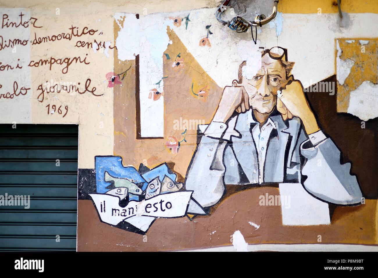 ORGOSOLO, ITALY - MAY 21, 2014: Murals wall paintings about political ...
