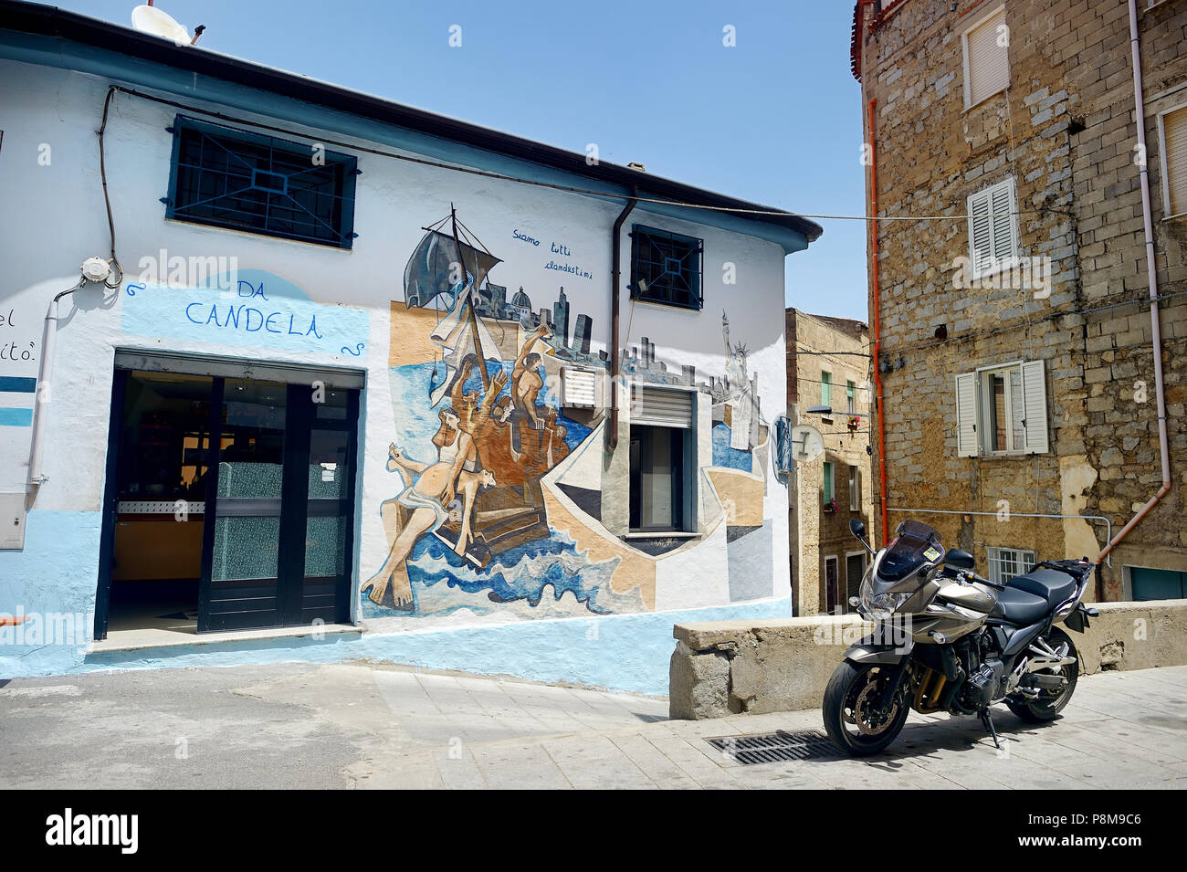 ORGOSOLO, ITALY - MAY 21, 2014: Murals wall paintings about political ...