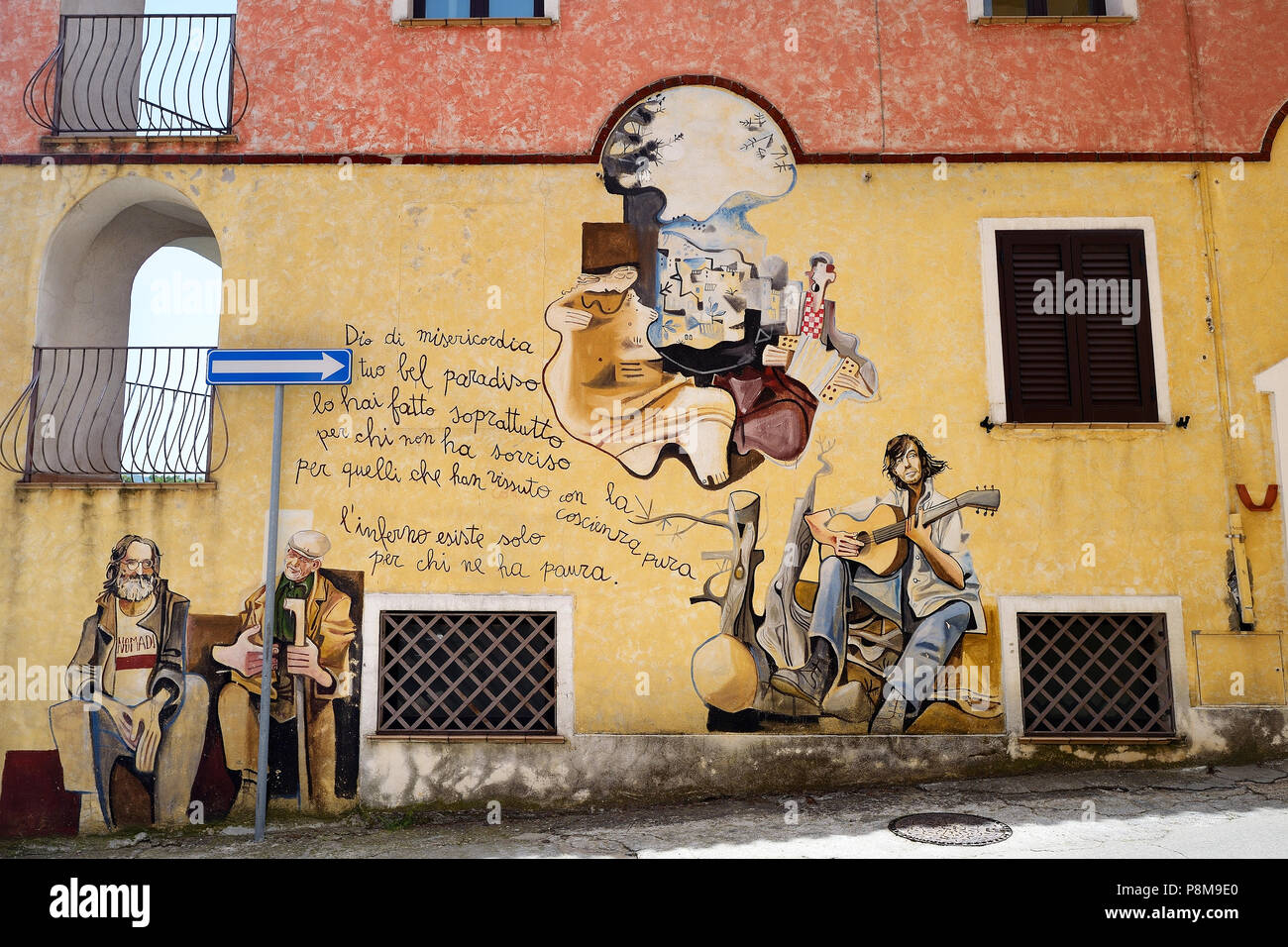 ORGOSOLO, ITALY - MAY 21, 2014: Murals wall paintings about political ...
