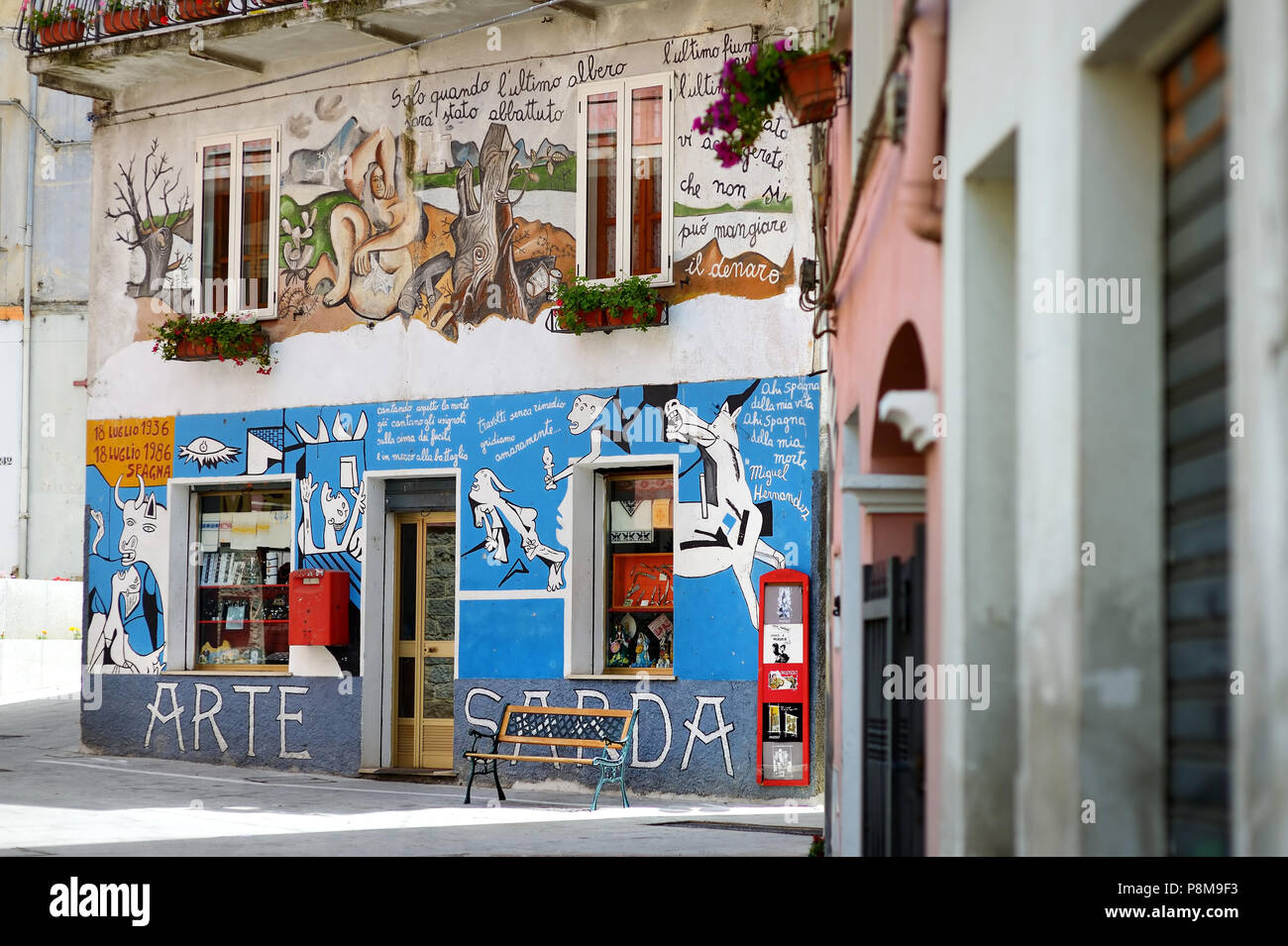 ORGOSOLO, ITALY - MAY 21, 2014: Murals wall paintings about political ...