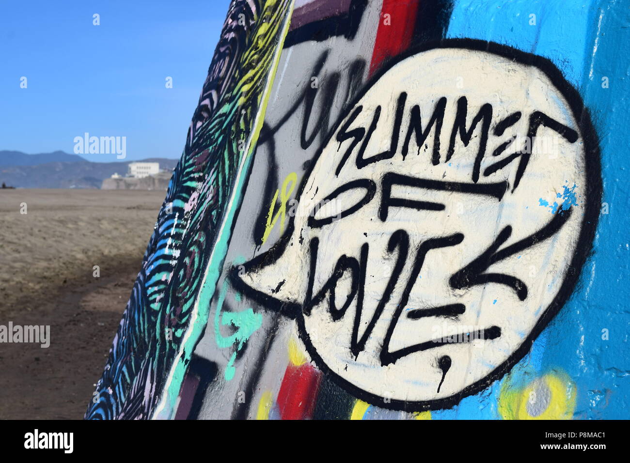 Colorful graffiti street art on beach wall in San Francisco, CA Stock ...
