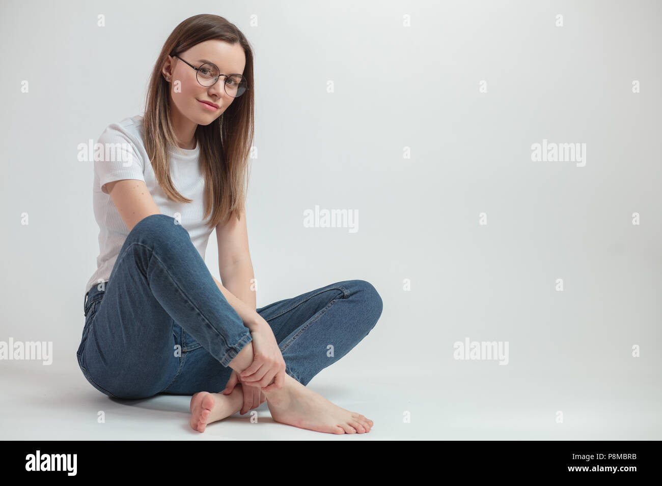 Female and sitting legs crossed closeup hi-res stock photography and ...
