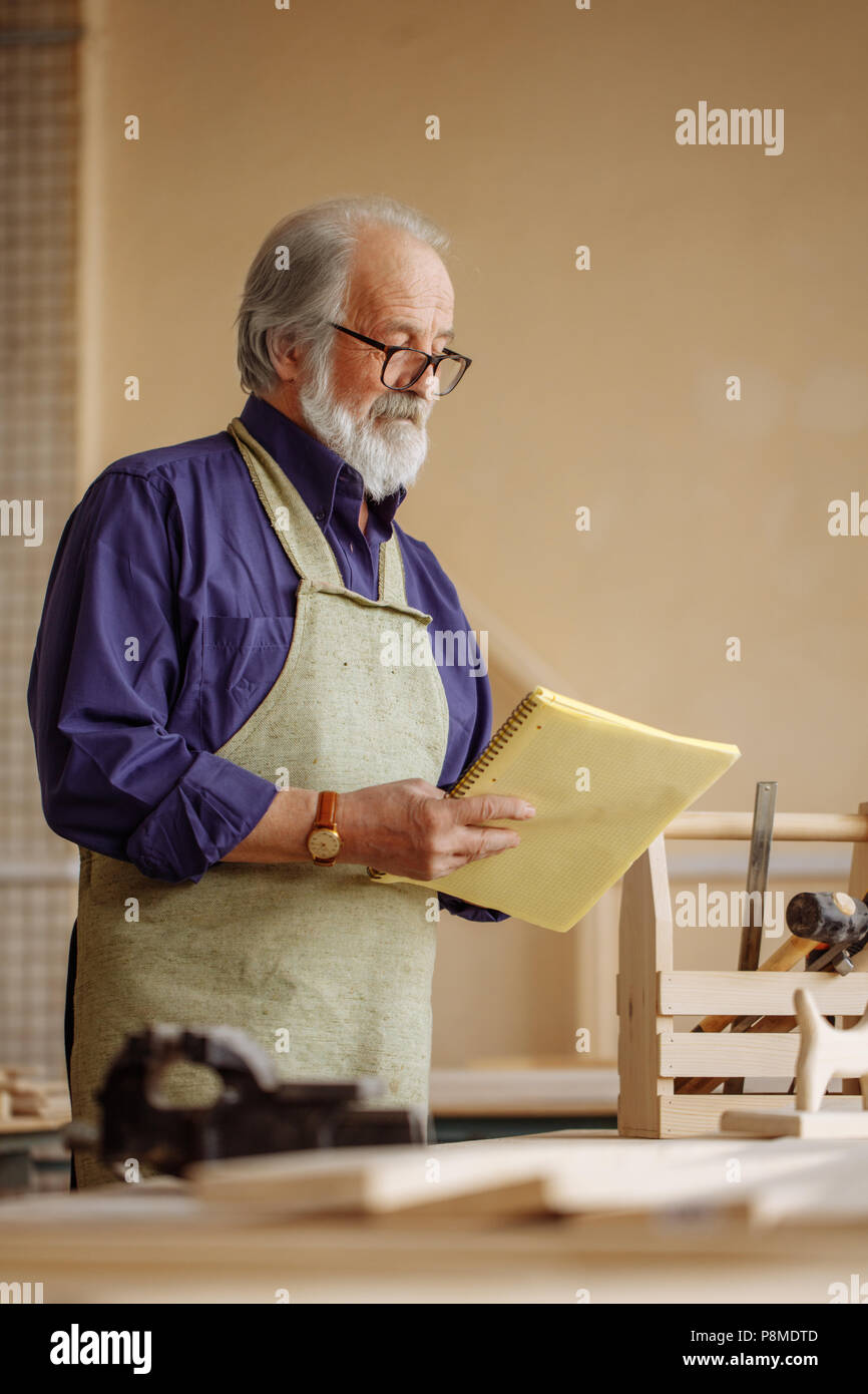 detailed drawing of gifted old carpenter. free time activities Stock ...
