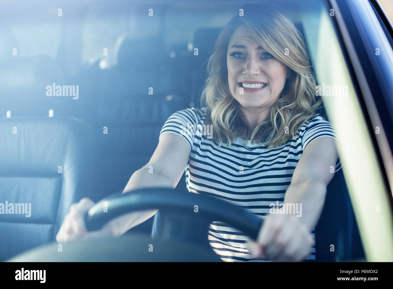 Angry woman driving car hi-res stock photography and images - Alamy