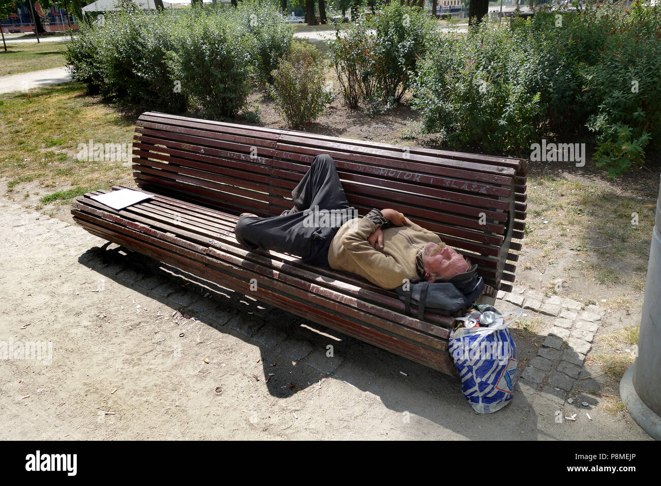 Homeless man sleeping rough hi-res stock photography and images - Alamy