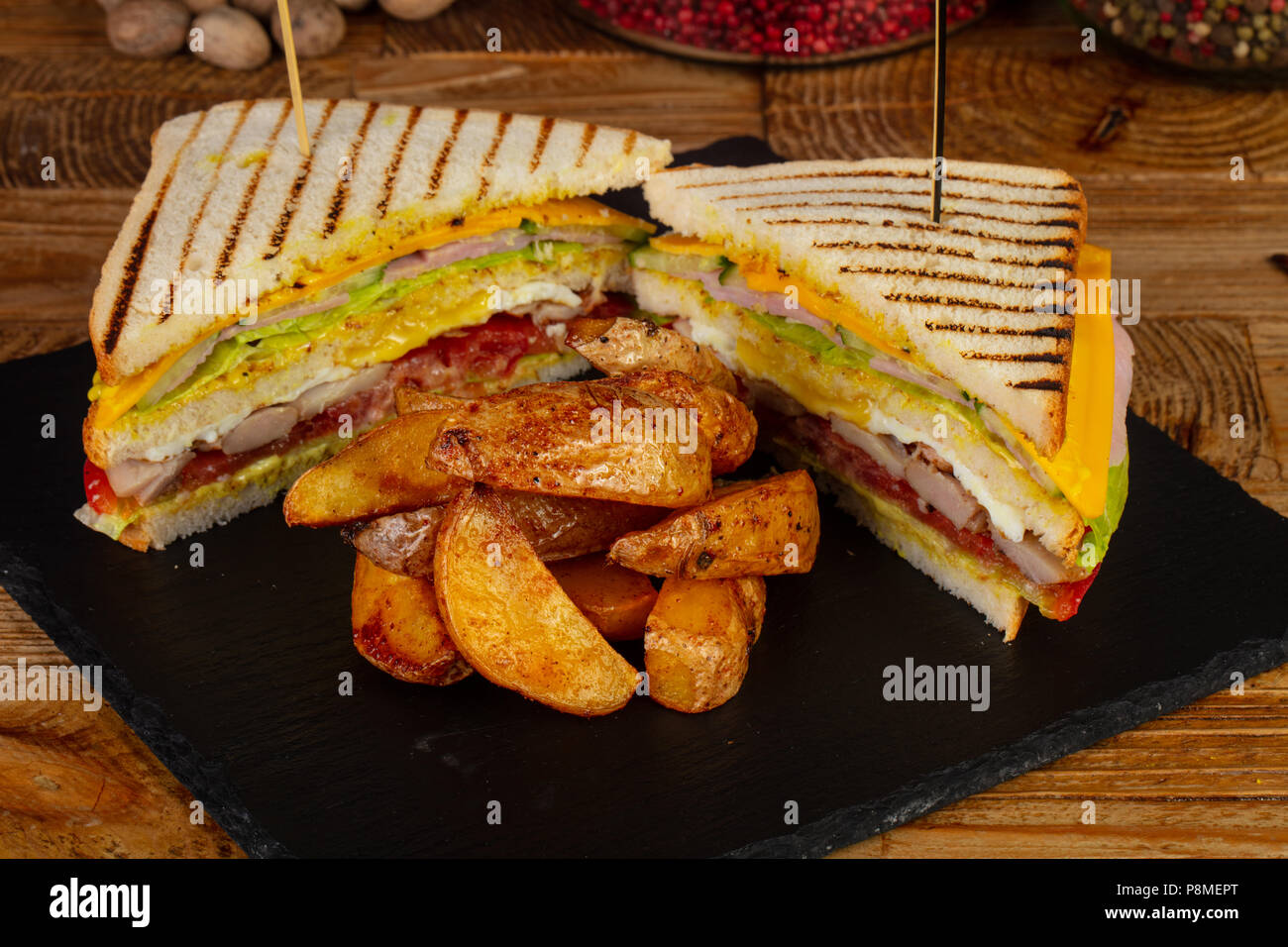 Delicious chef sandwich with fried french fries Stock Photo - Alamy
