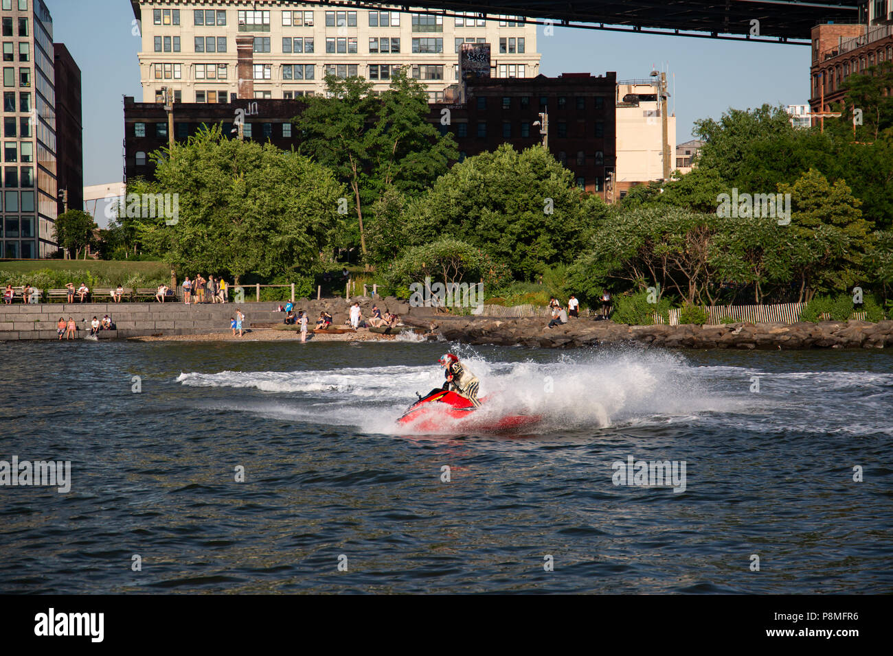 New York, City / USA - JUL 10 2018: Man wearing clown suite riding jet ...