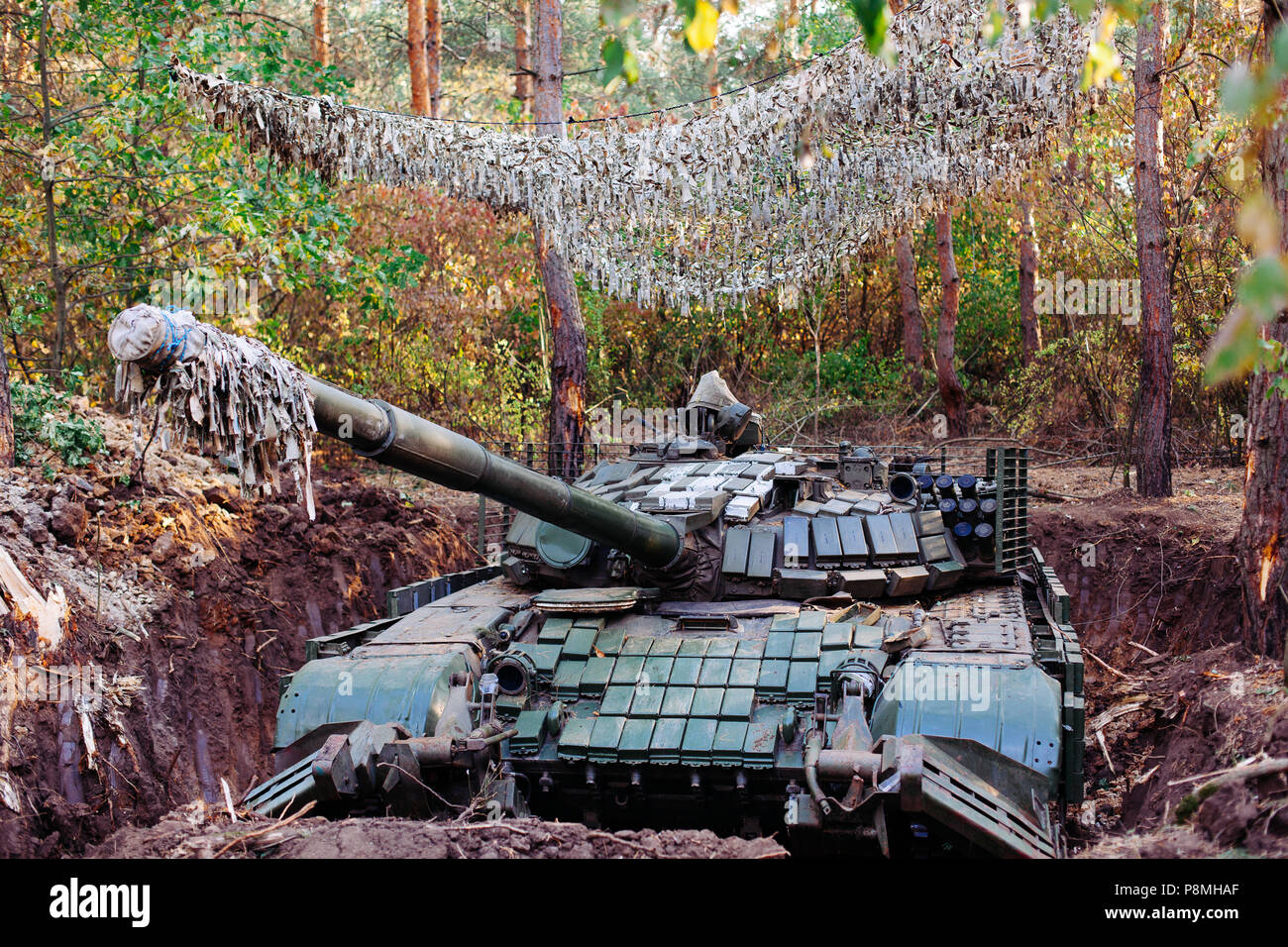 The tank from the hidden position is disguised in the trench Stock ...