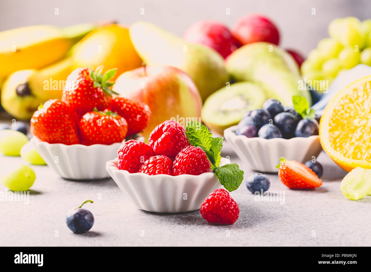Fresh assorted fruits and berries Stock Photo - Alamy